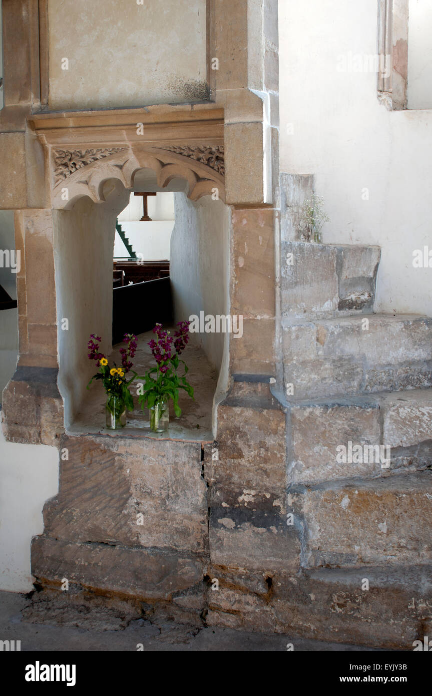 A squint and stone steps inside St. Michael and All Angels Church ...