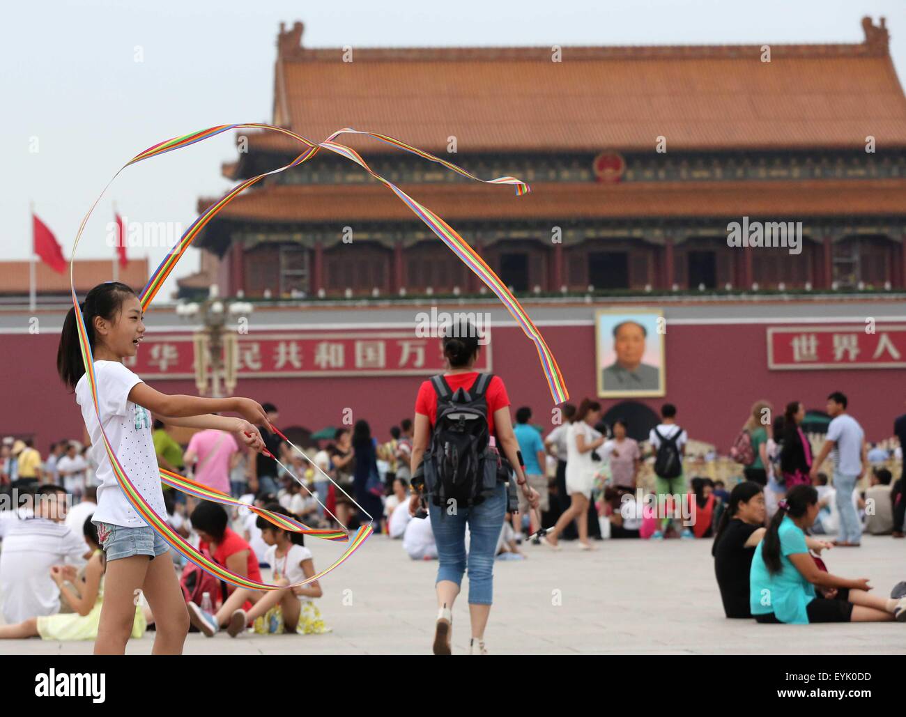 Beijing, China. 31st July, 2015. A girl has fun on the Tian'anmen ...