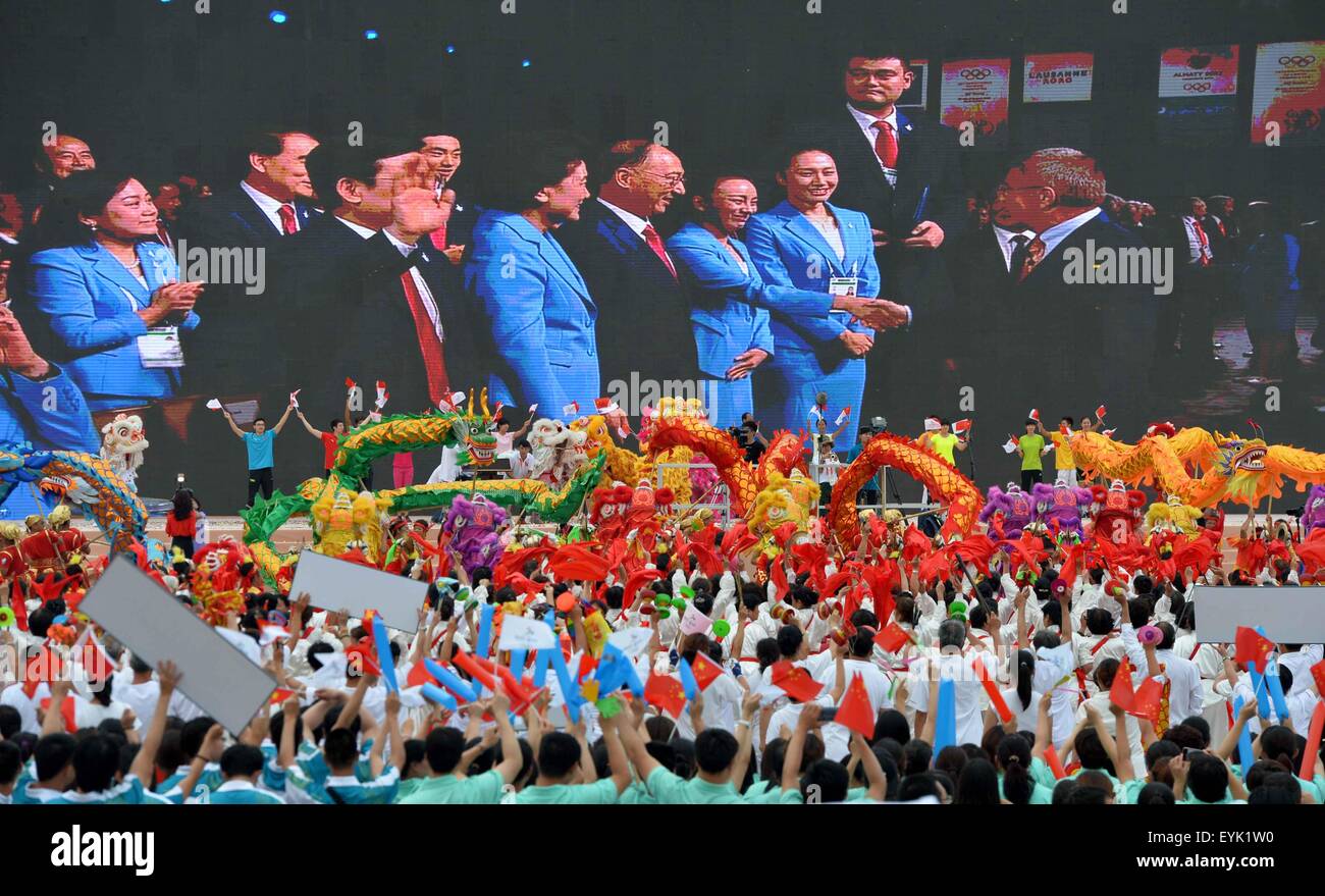 Beijing, China. 31st July, 2015. People gather to celebrate at the ...