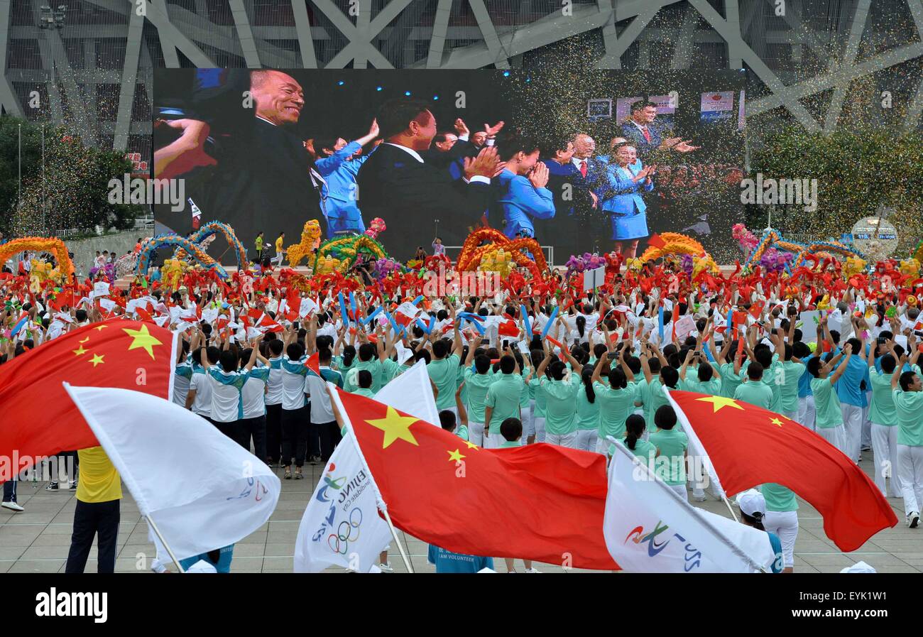 Beijing, China. 31st July, 2015. People gather to celebrate at the ...