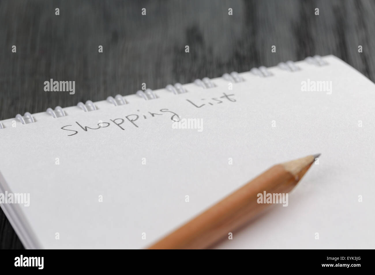 closeup photo of open empty notepad with shopping list phrase Stock ...