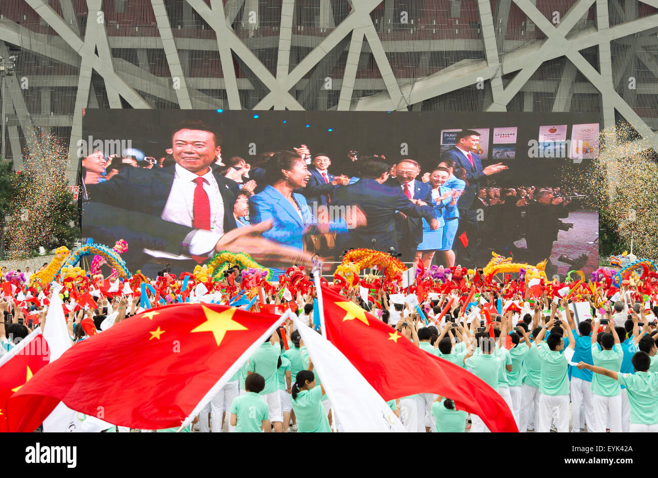Beijing, China. 31st July, 2015. People gather to celebrate at the ...