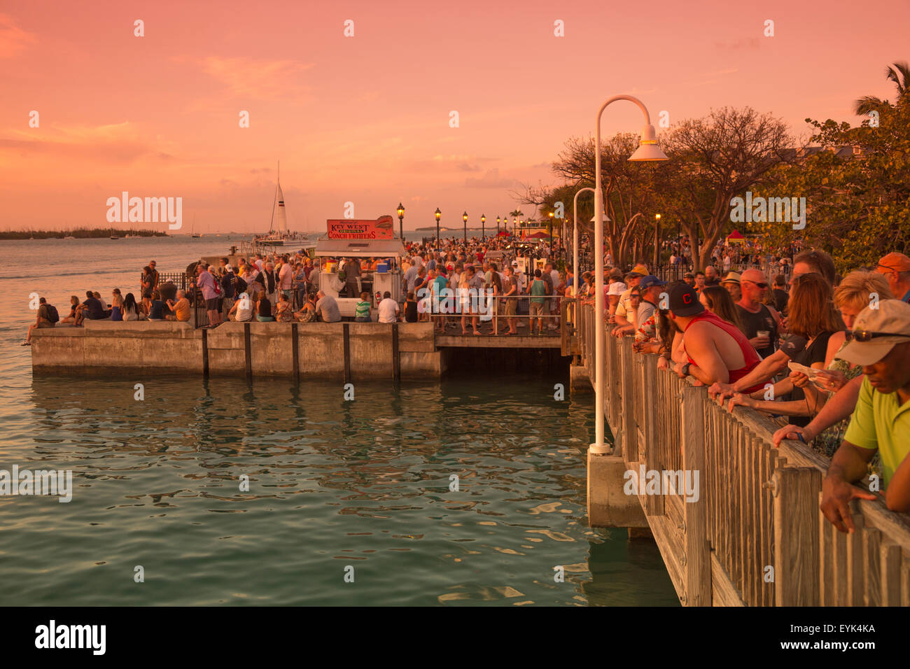 TOURISTS WATCHING SUNSET MALLORY SQUARE OLD TOWN HISTORIC DISTRICT KEY ...