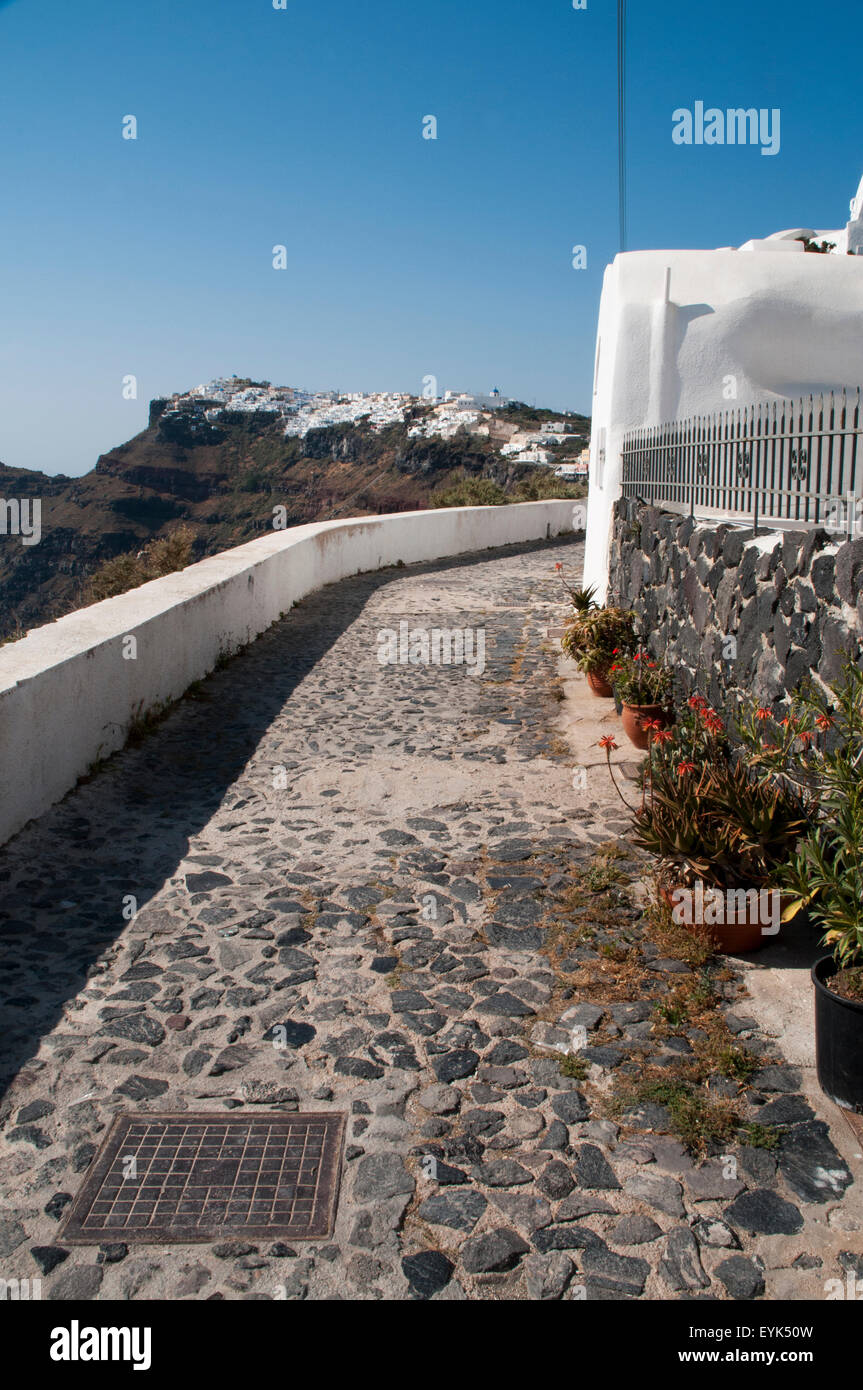 Cobblestone pathway on Santorini Island in the Aegean Sea, which is a ...