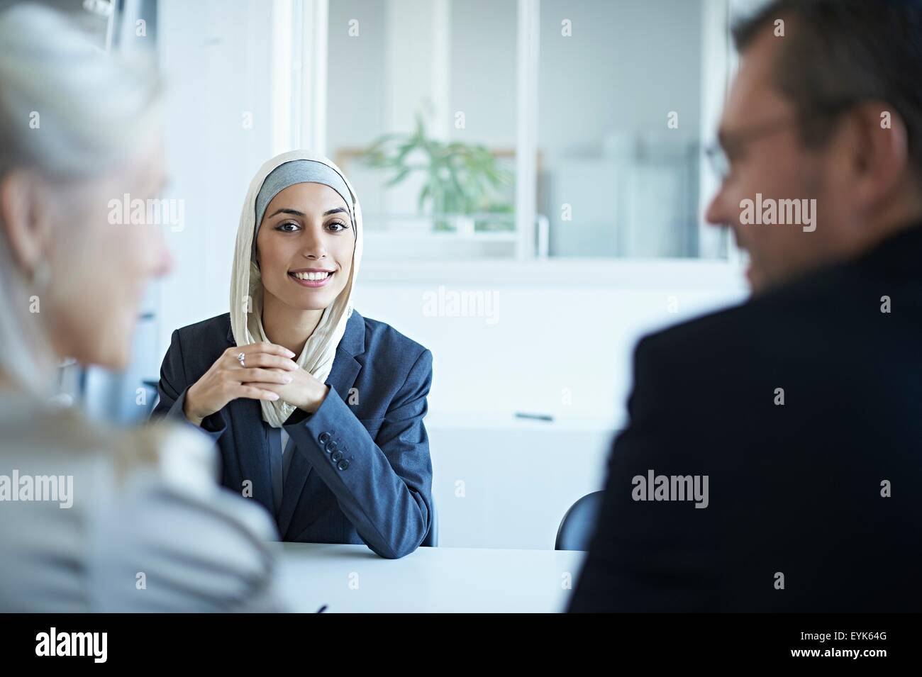 Over shoulder view of young businesswoman at interview in office Stock ...
