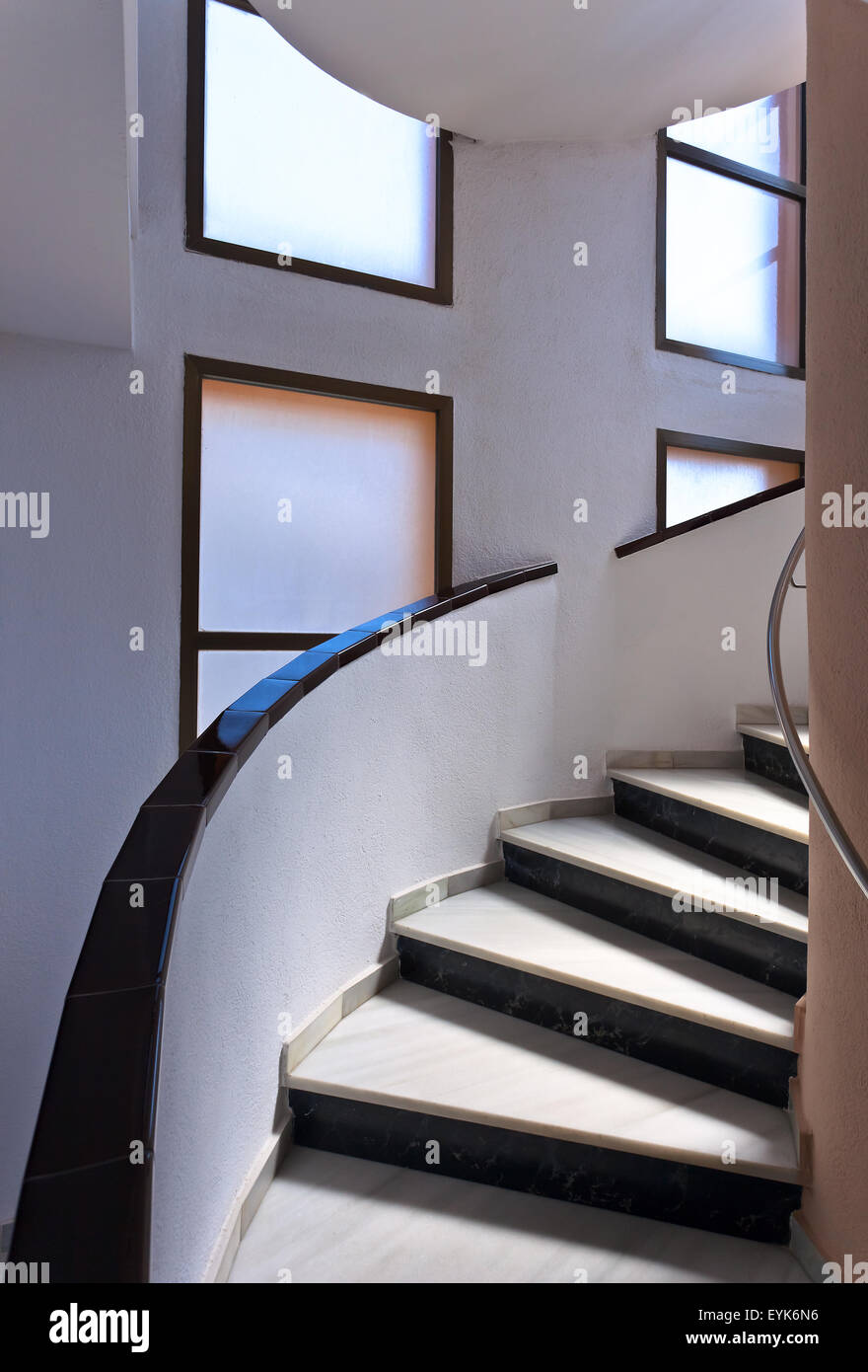 the ladder in a modern building with white walls Stock Photo - Alamy