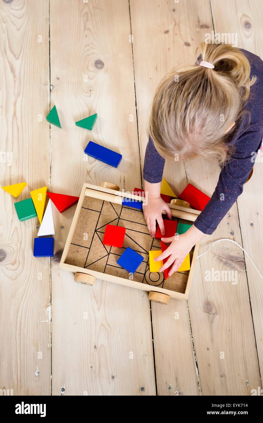 Girl with blocks on floor hi-res stock photography and images - Alamy