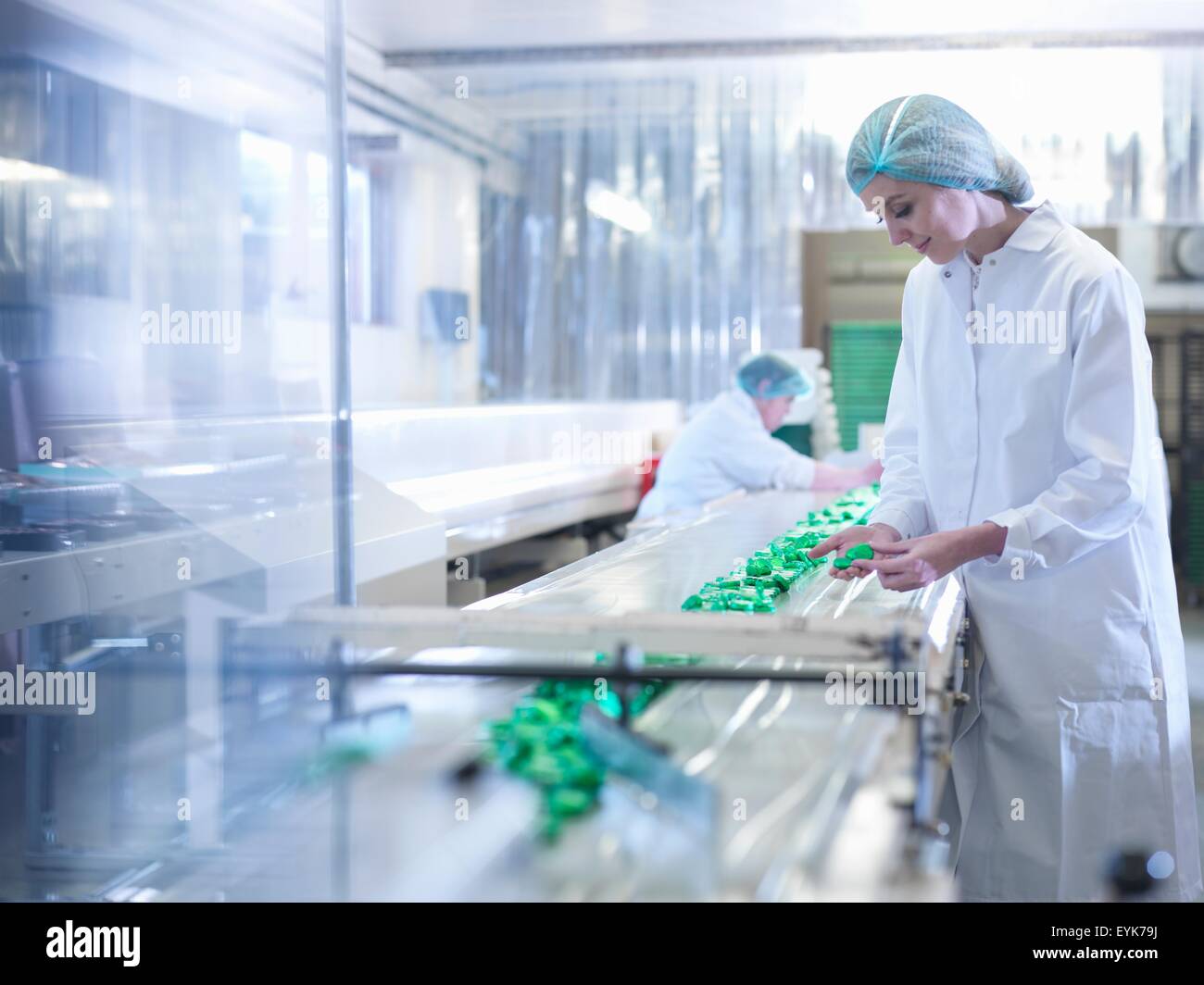 Inspecting chocolate production line hi-res stock photography and ...