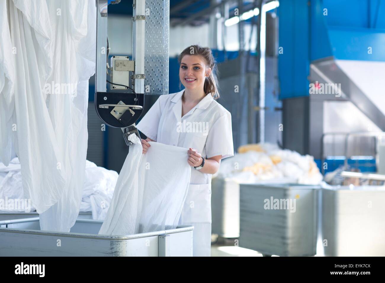 Woman sorting laundry washing machine hi-res stock photography and ...