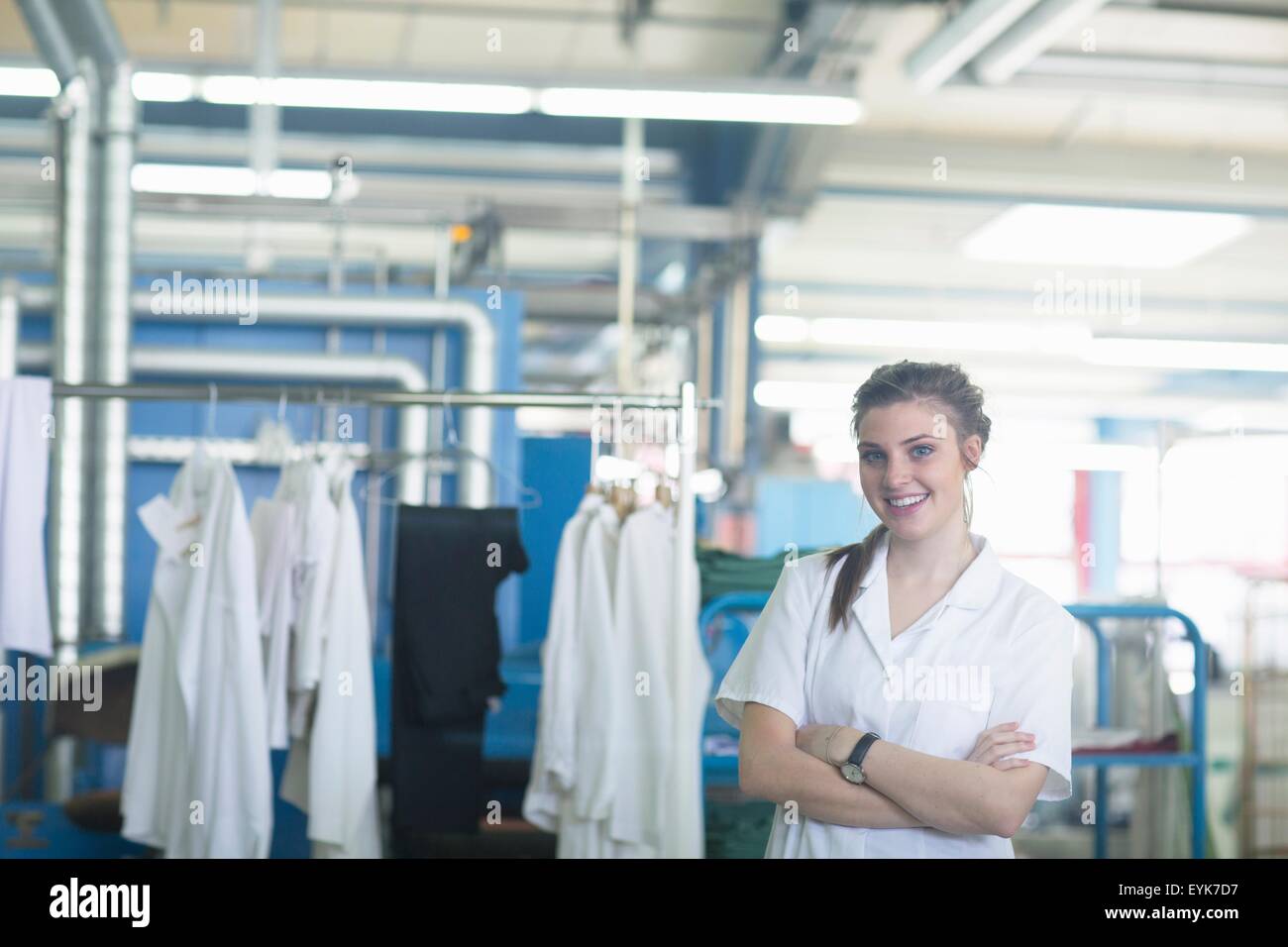 Woman working in laundry Stock Photo - Alamy