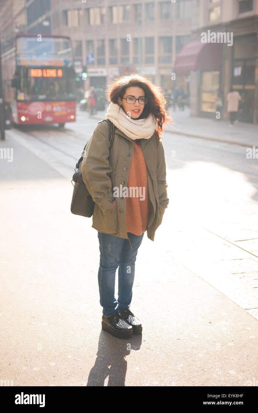 Portrait of young female commuter on street Stock Photo - Alamy