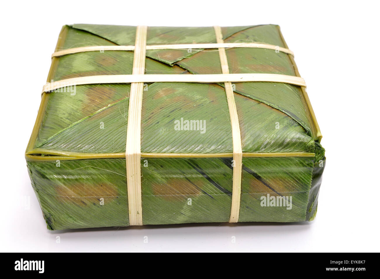 stuffed sticky rice cake or Banh Chung on a white background Stock ...