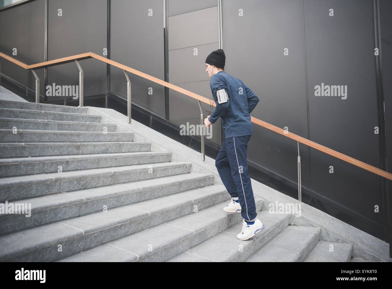 Man moving up stairs hi-res stock photography and images - Alamy