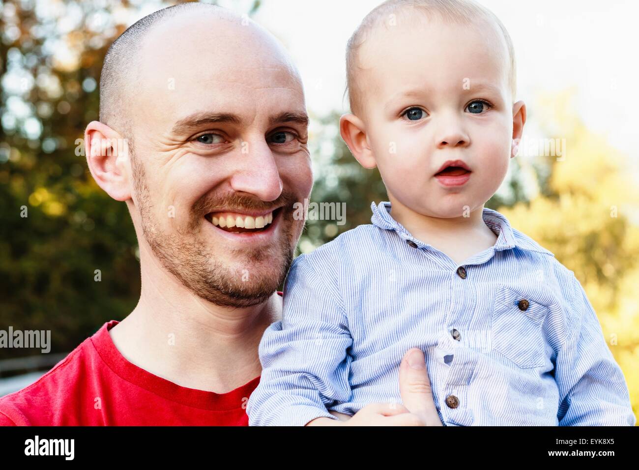 Portrait of father and son Stock Photo - Alamy