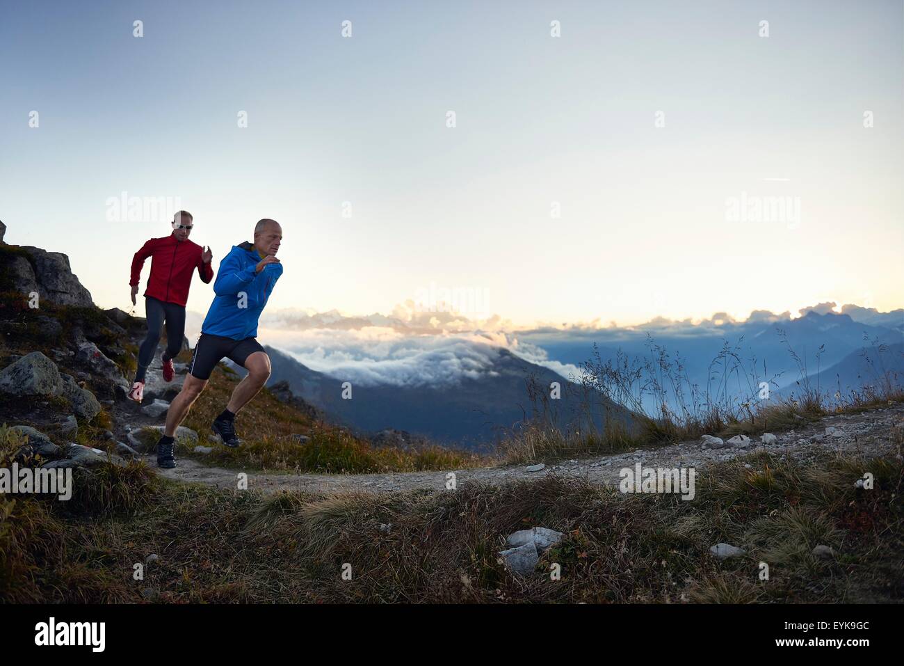 Two mature men trail running hi-res stock photography and images - Alamy