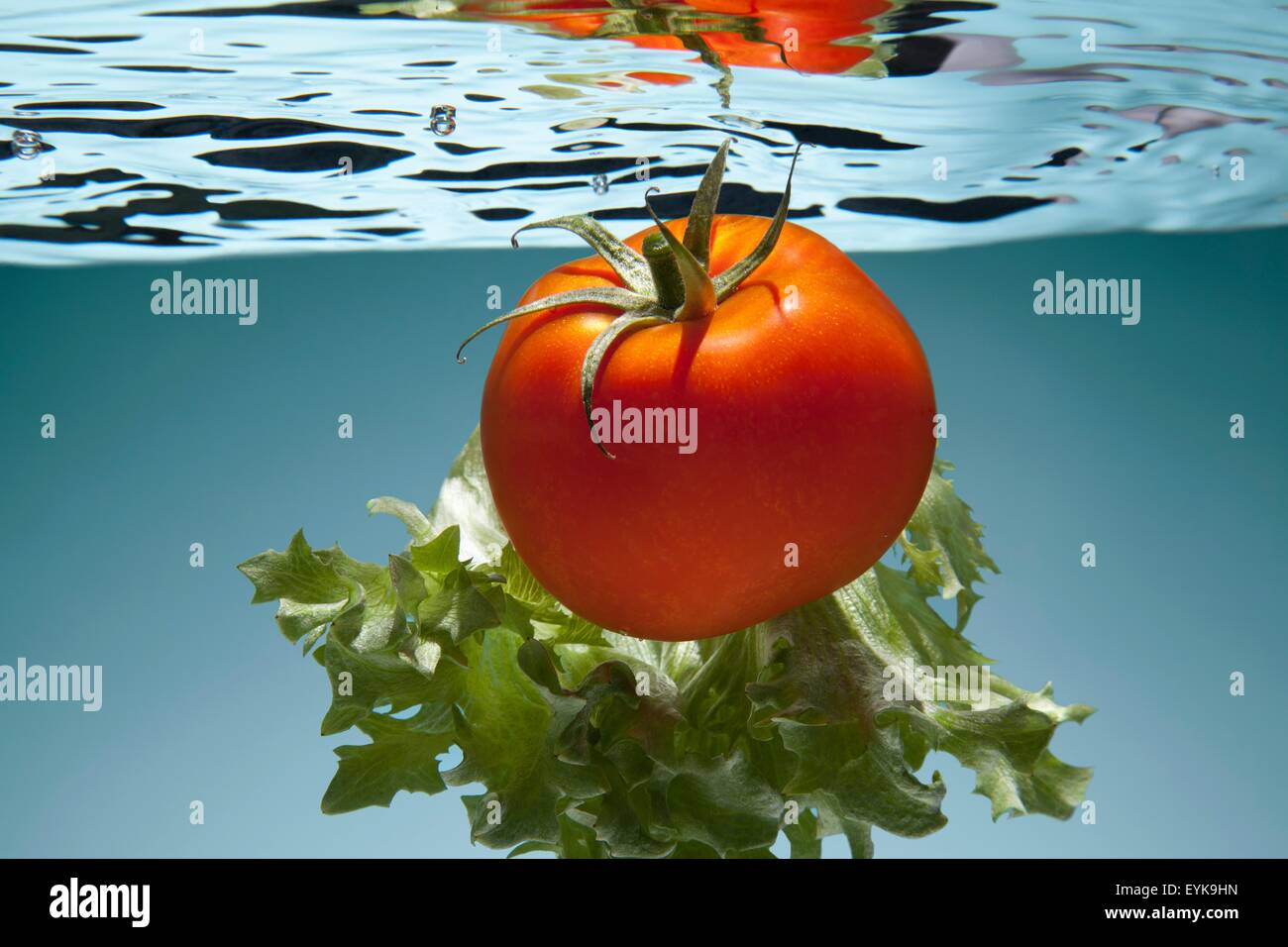 Floating tomato hi-res stock photography and images - Alamy