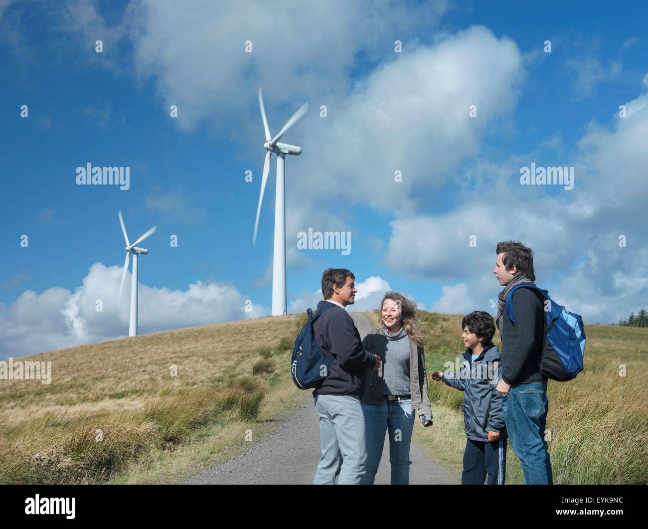 Walkers and wind turbine hi-res stock photography and images - Alamy
