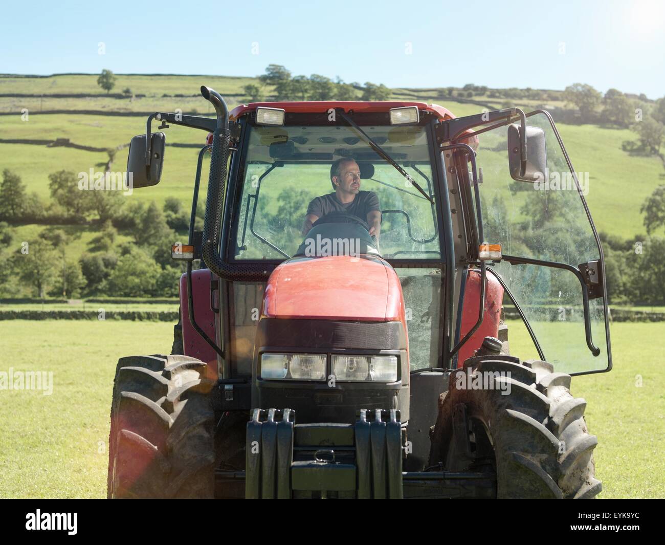 Farmer Driving His Tractor High Resolution Stock Photography and Images ...