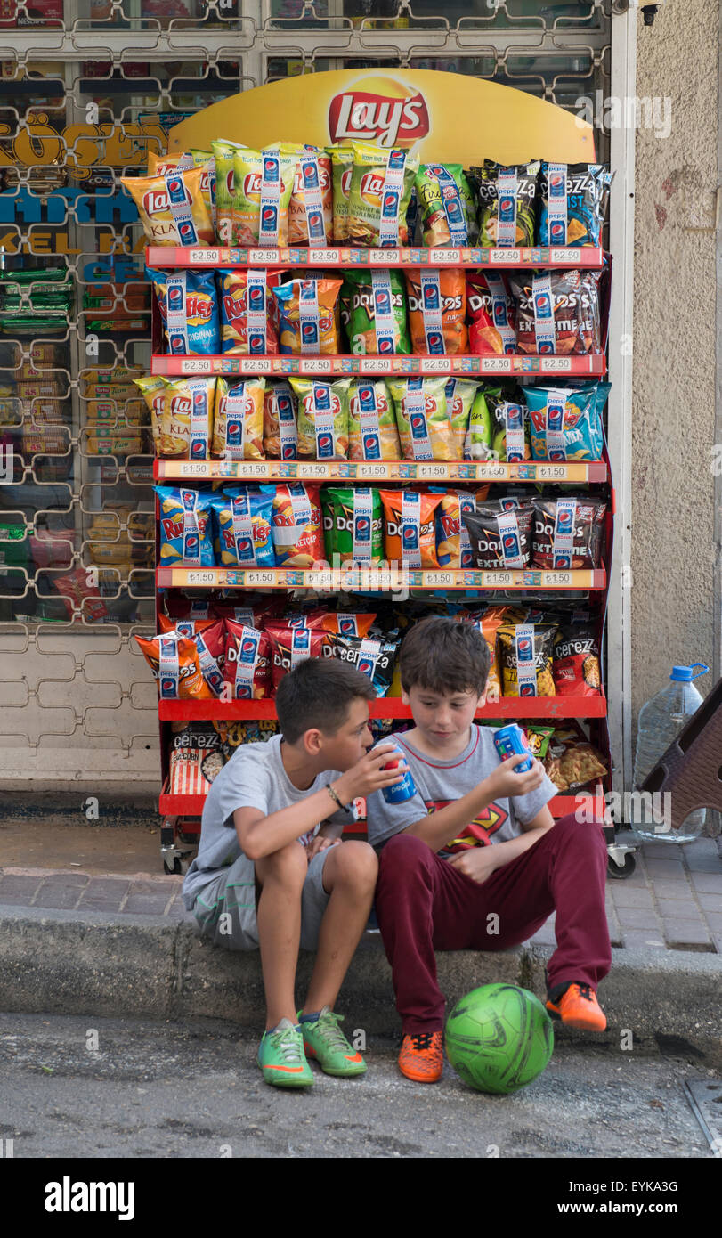 Two boys chatting Stock Photo - Alamy