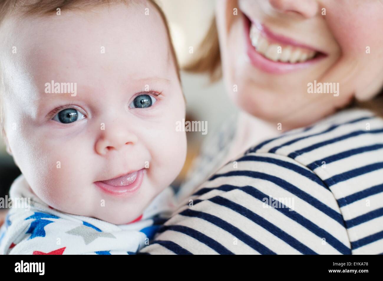 Baby girl smiling at camera Stock Photo - Alamy