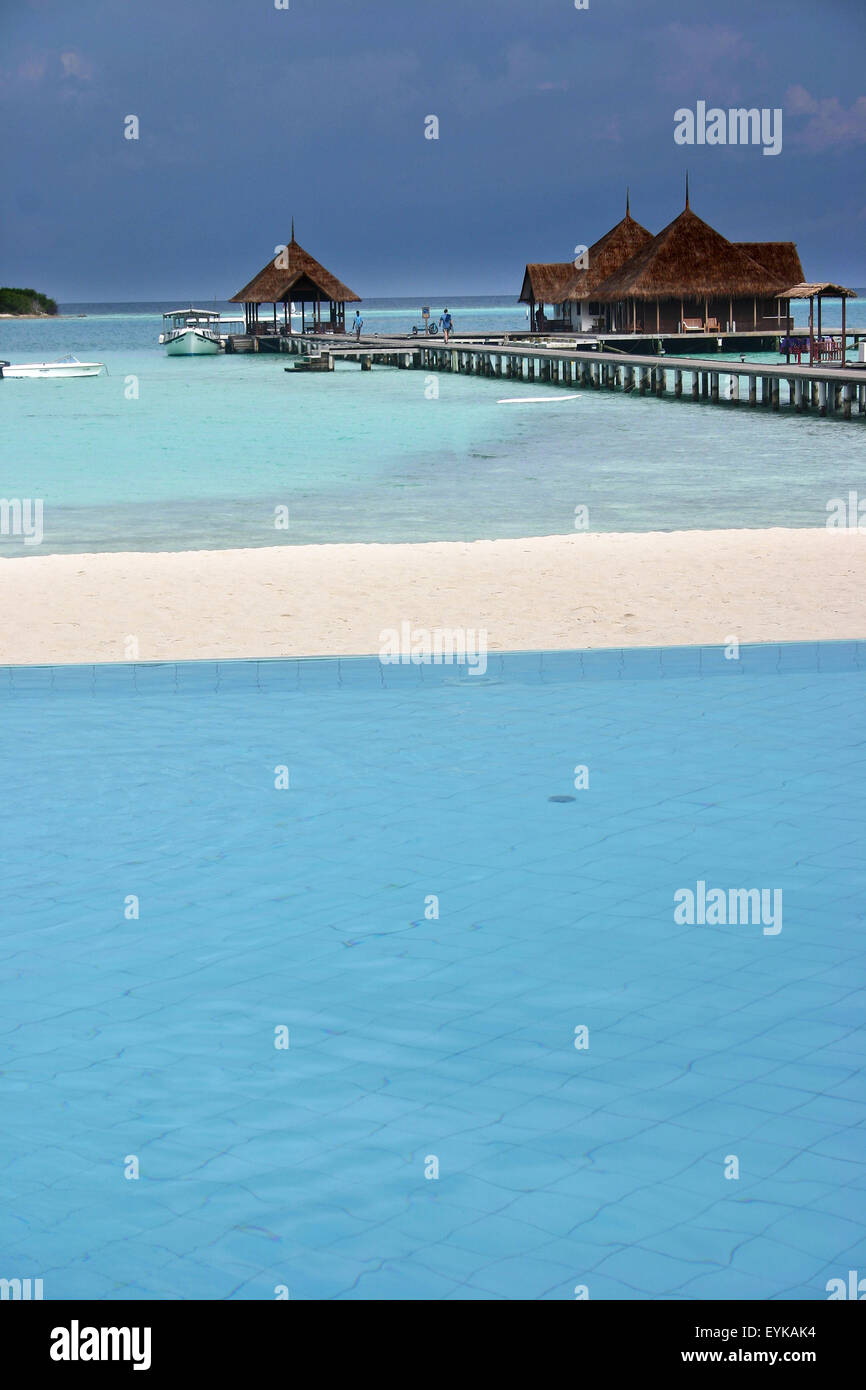 Maldives islands blue water; pool water on first plan Stock Photo - Alamy