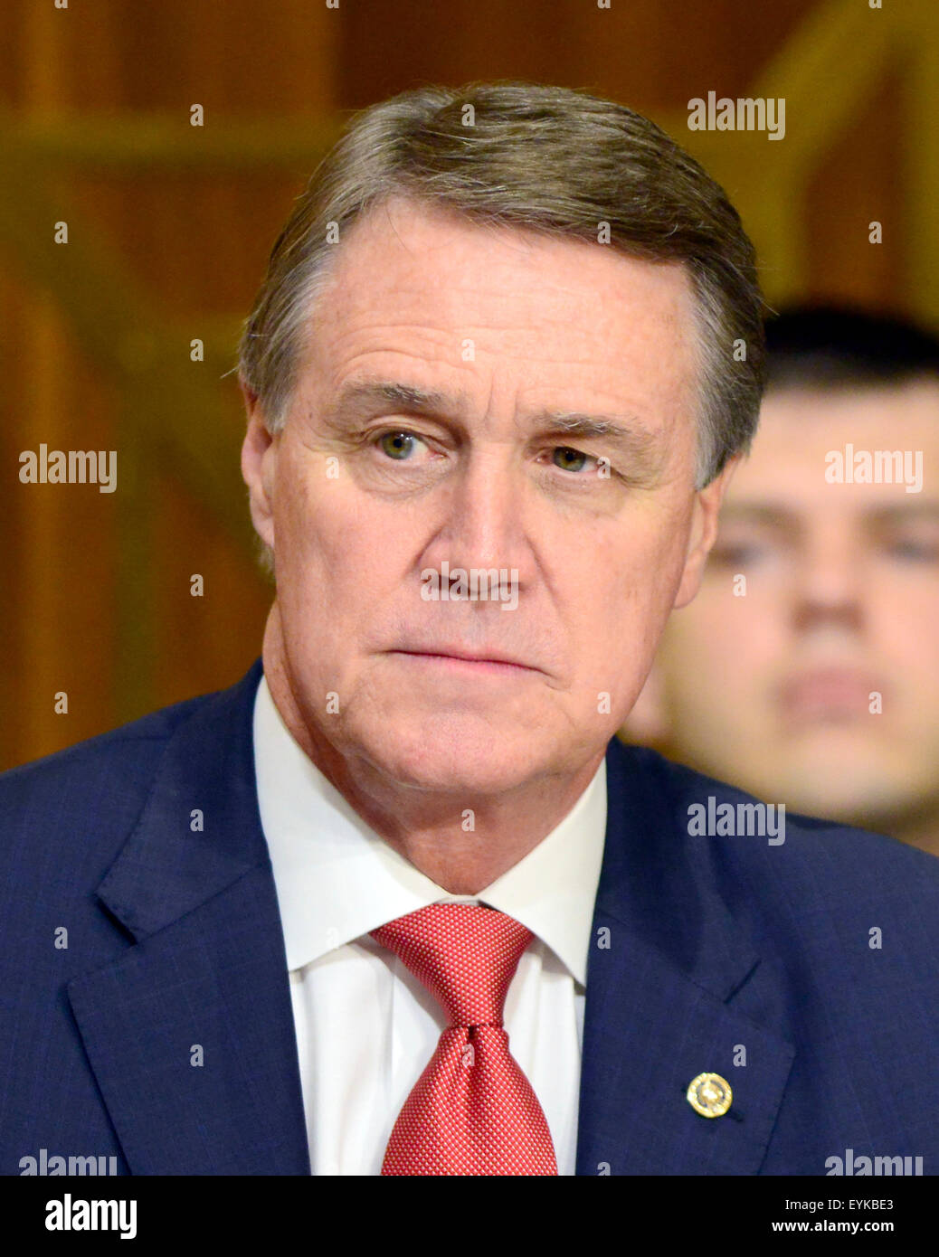 United States Senator David Perdue (Republican of Georgia) listens to ...