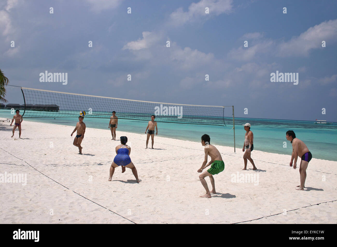 Playing volleyball at the beach in a resort in the maldives Stock Photo ...