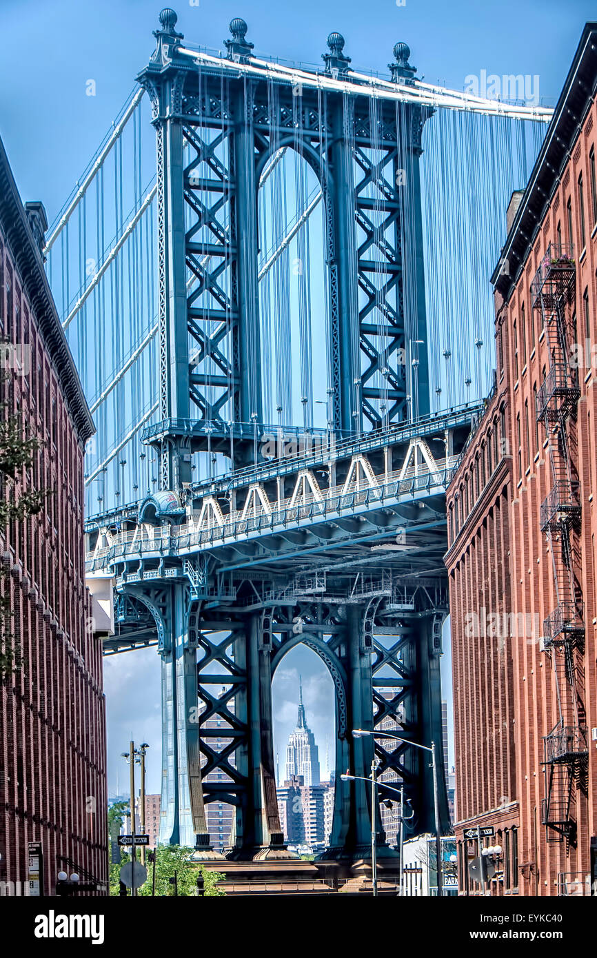 Empire State Building viewed through the Manhattan Bridge Stock Photo ...