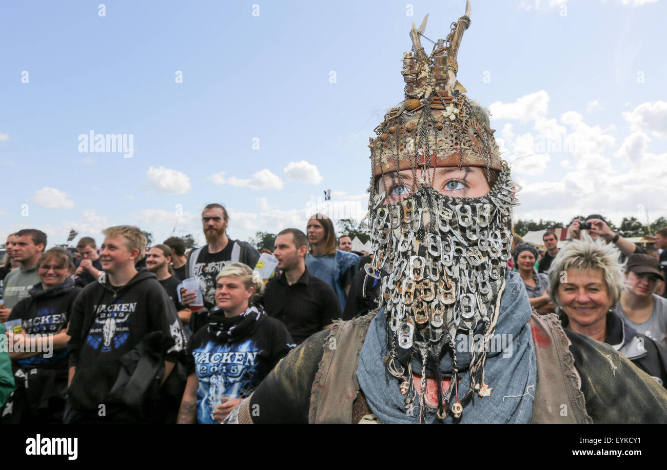 Wacken, Germany. 31st July, 2015. Festivalgoers in front of the stage ...