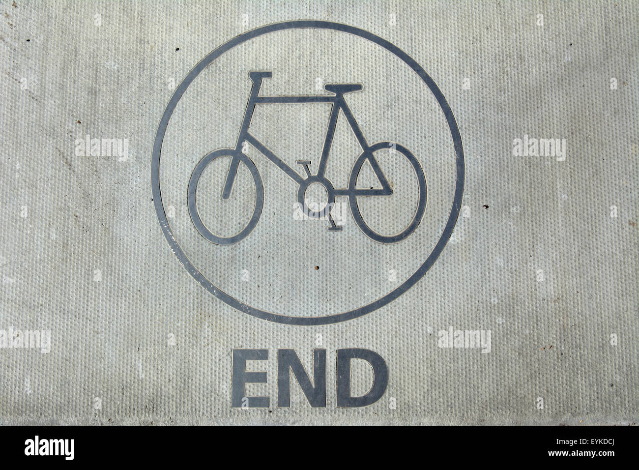 pavement sign marking end of a cycle lane, on chiswick bridge, london ...