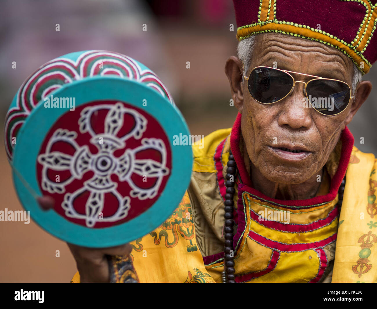 July 31, 2015 - Kathmandu, Nepal - A Tibetan Buddhist monk plays ...