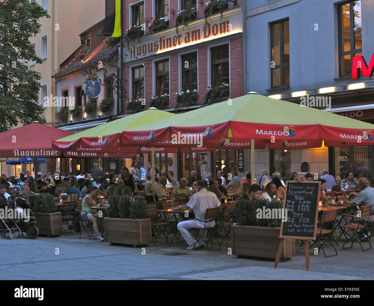 Germany, Upper Bavaria, Munich, restaurants at cathedral Stock Photo ...