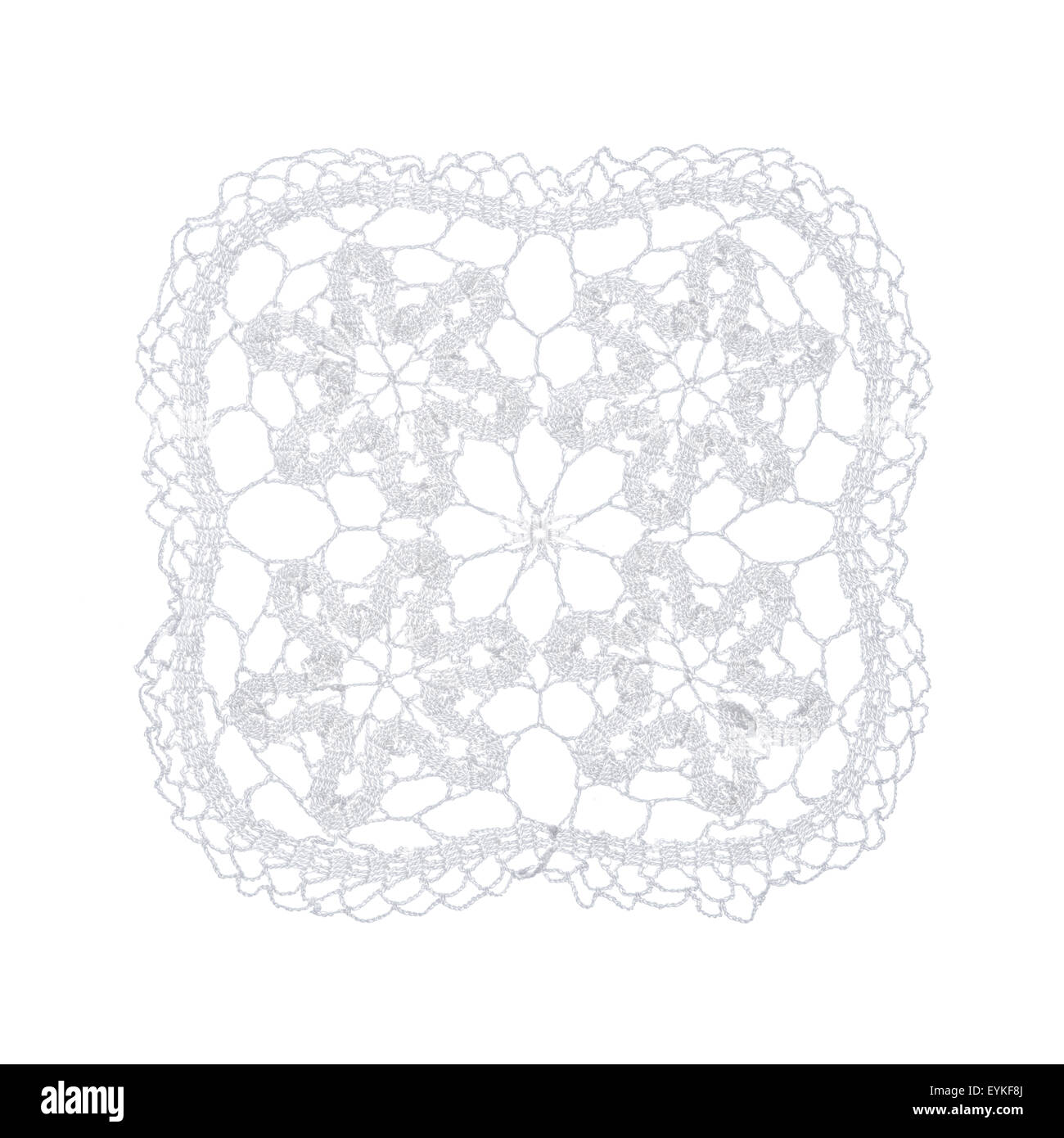 White lace doily before background as a cut out Stock Photo - Alamy
