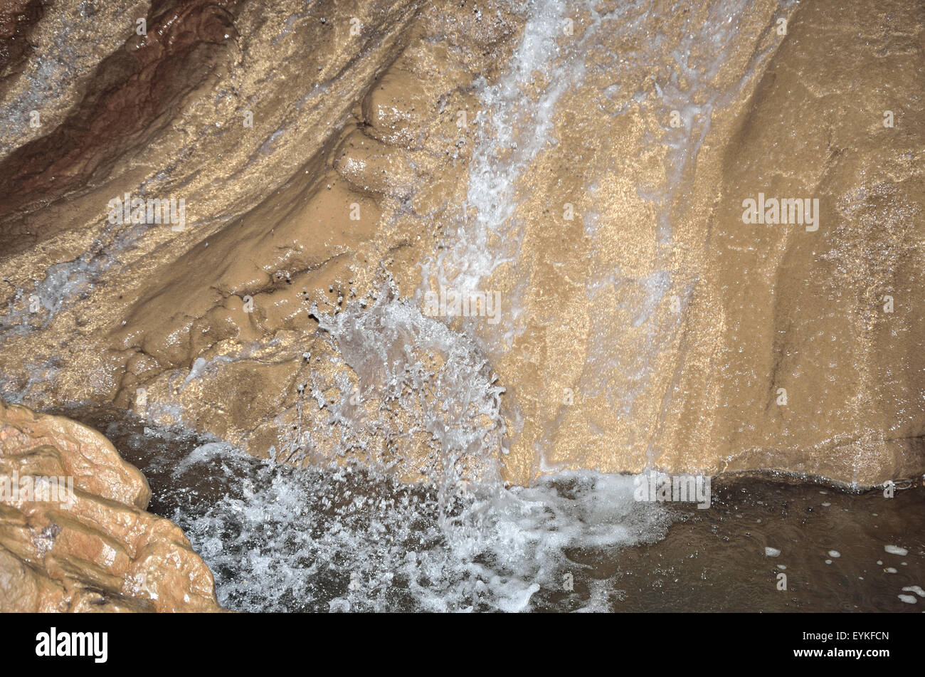 Spring shot on walls of ancient cave Stock Photo - Alamy