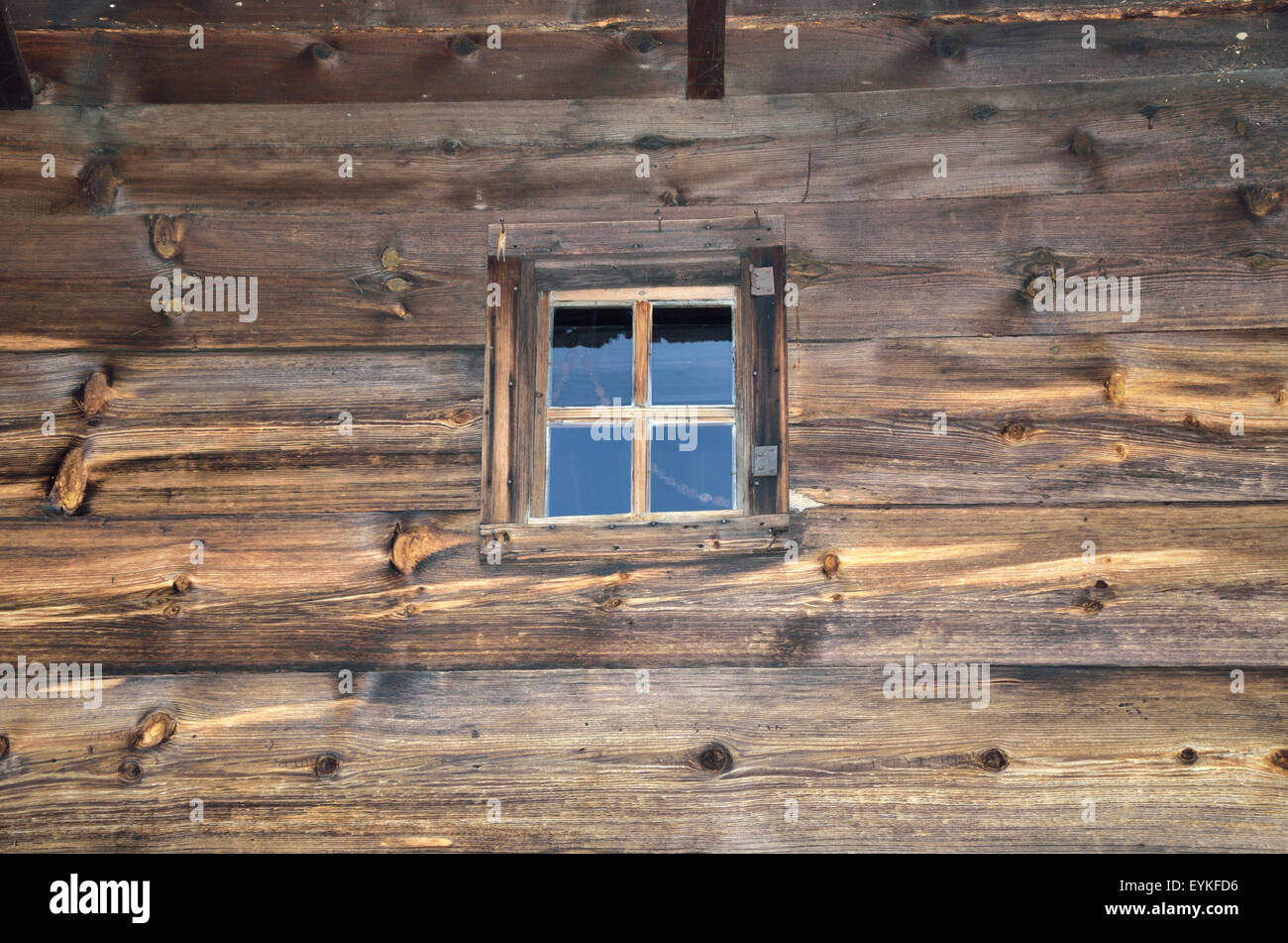 Small ancient wooden window of a traditional village house Stock Photo ...