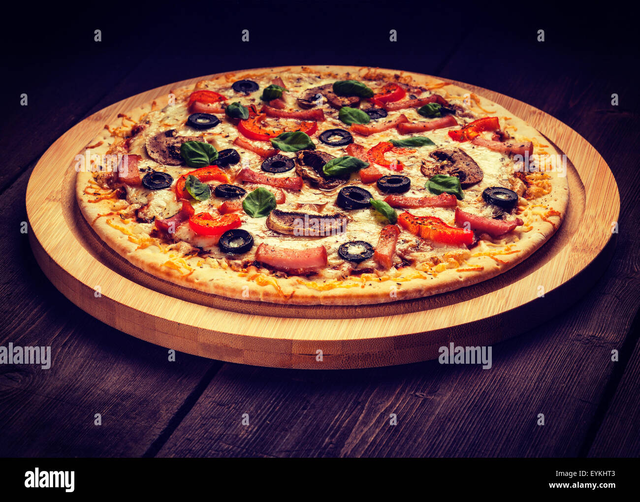 Vintage retro effect filtered hipster style image of ham pizza with ...