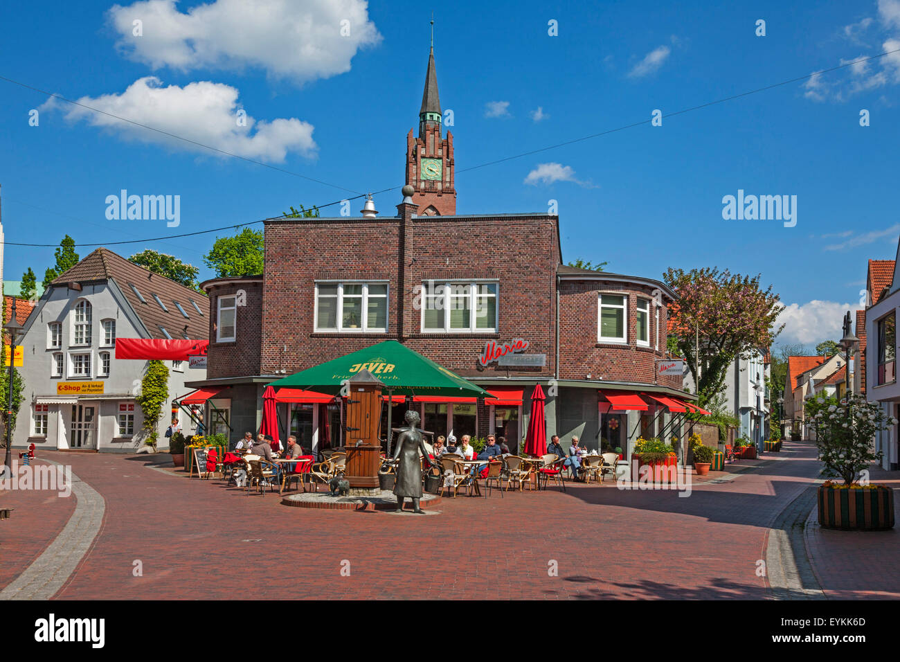 Pedestrian area, water carrier with dog, street café, Old Town, Jever ...