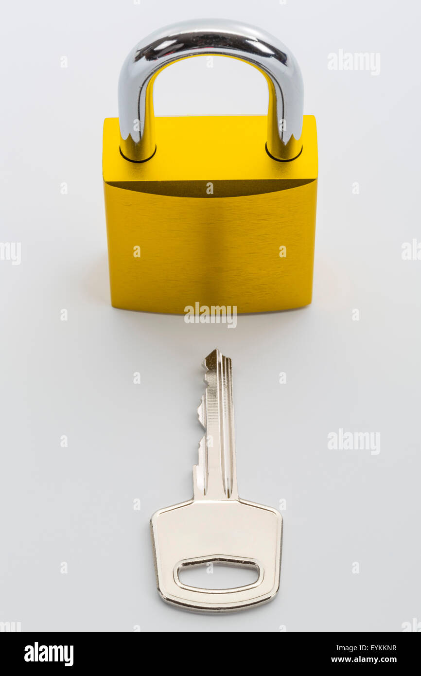 Key beside concluded padlock, symbolic picture, security Stock Photo ...