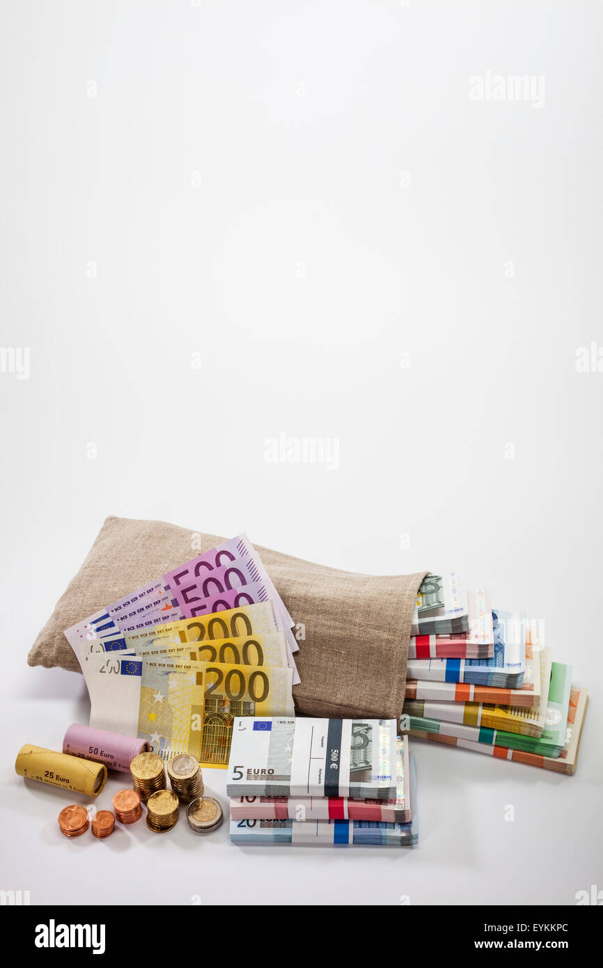 Bag coins notes hi-res stock photography and images - Alamy