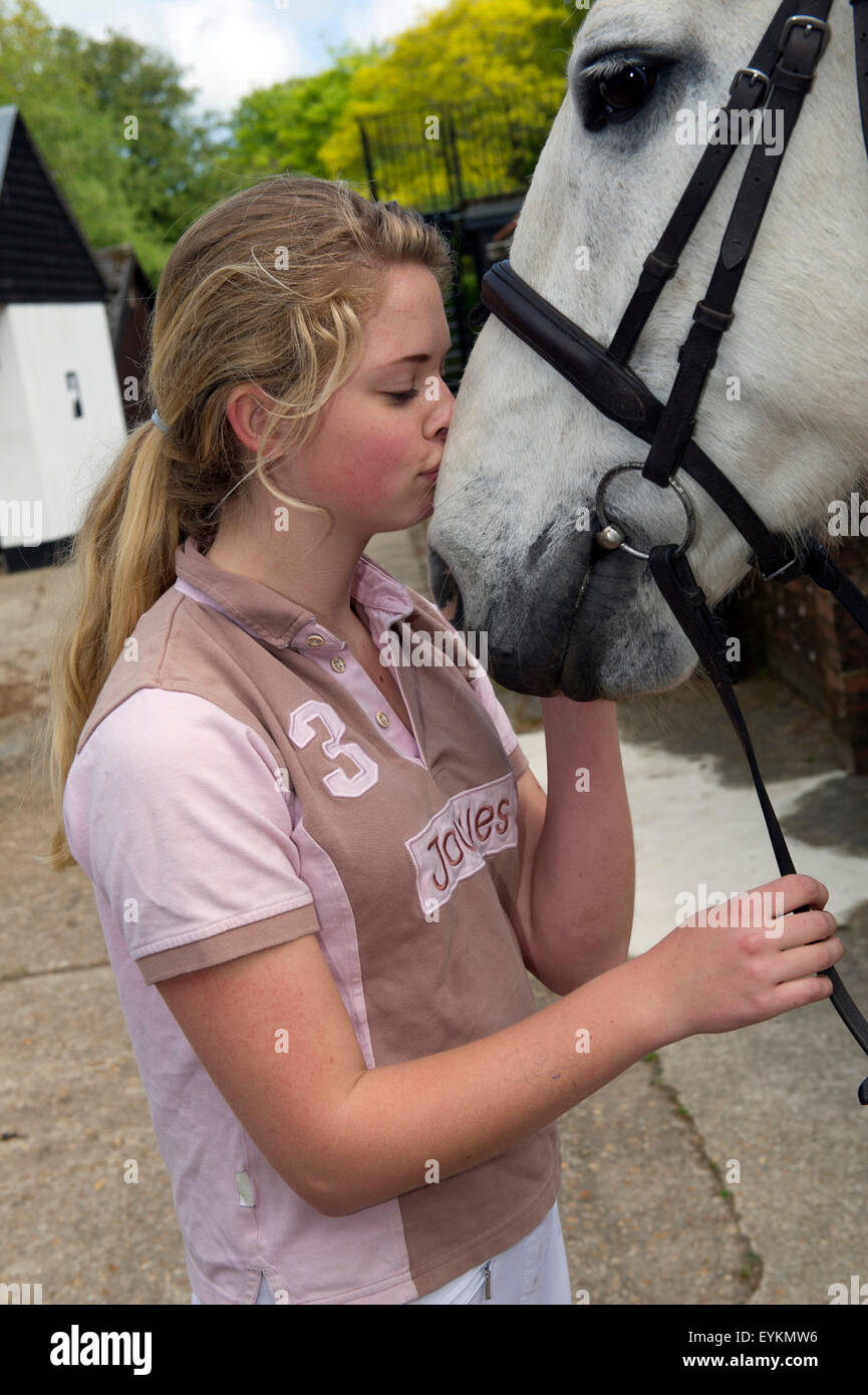 Ella Manning training her horse 'Turner' in a showjumping arena ...