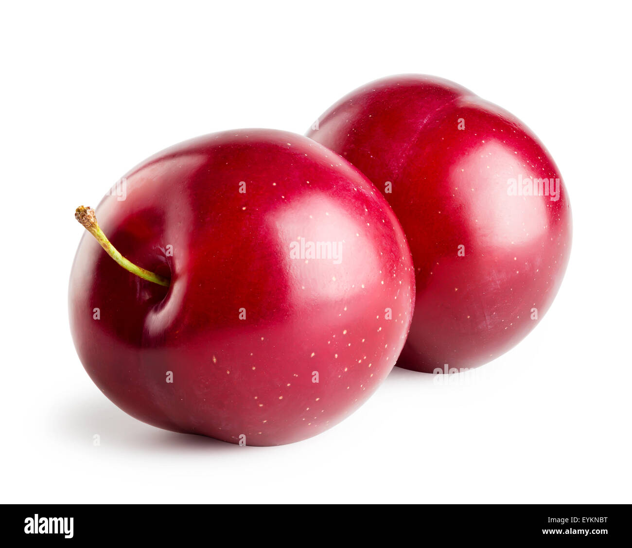 Two ripe plums isolated on white background Stock Photo - Alamy