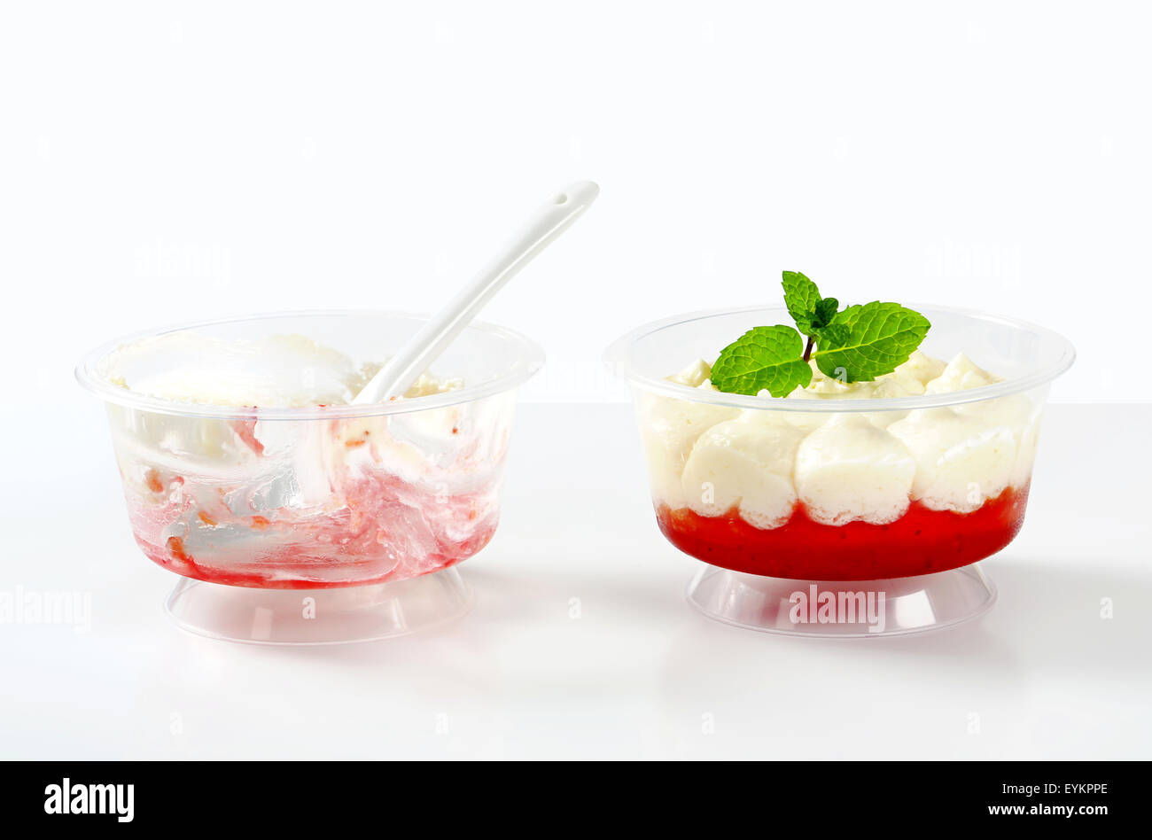 Two cups of strawberry shortcake dessert - one eaten, one full Stock ...