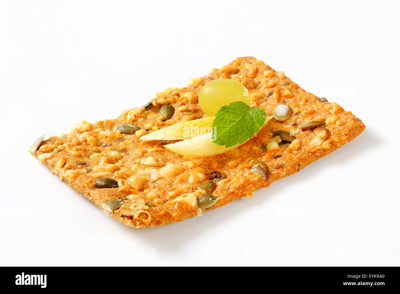 Whole grain cracker with cheddar and pepitas Stock Photo - Alamy