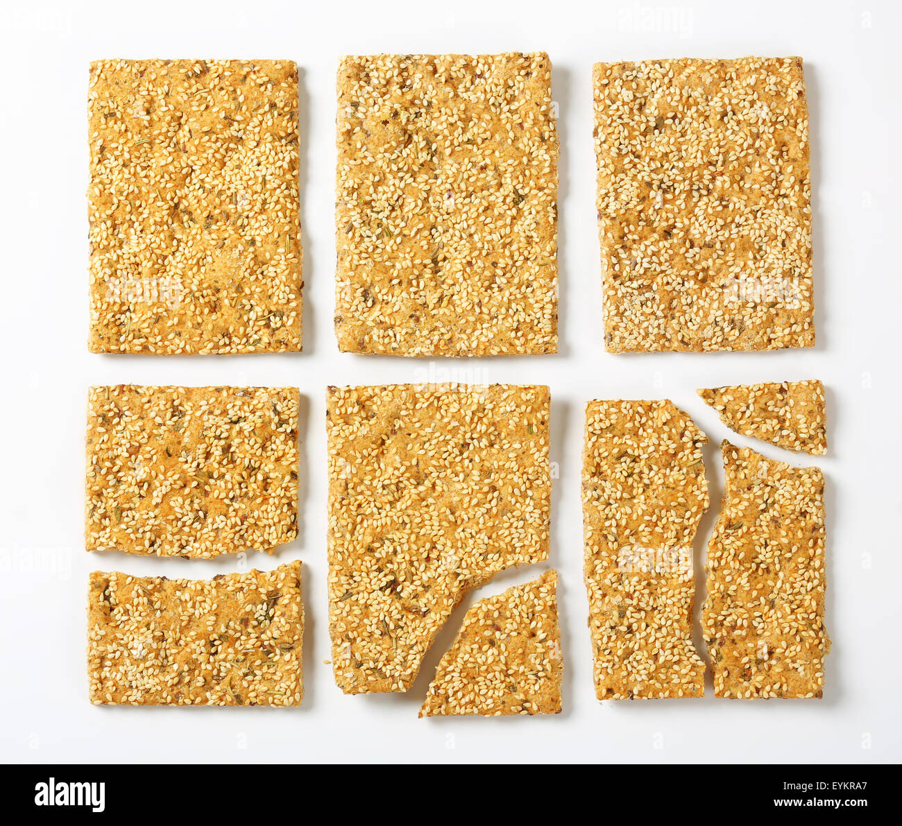 Whole wheat crackers with sesame seeds and chopped herbs Stock Photo ...