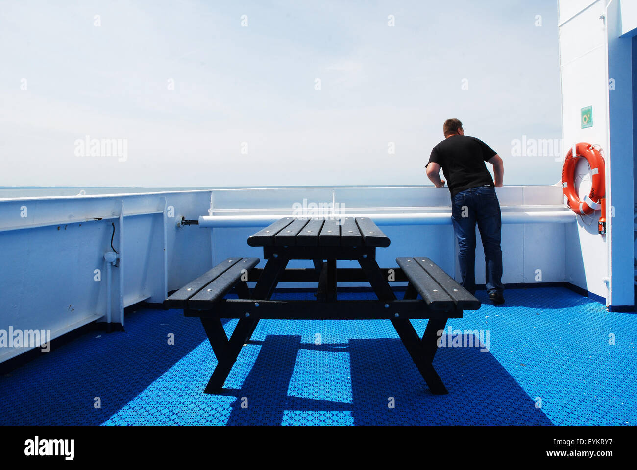 Outside deck, ferry, man Stock Photo - Alamy