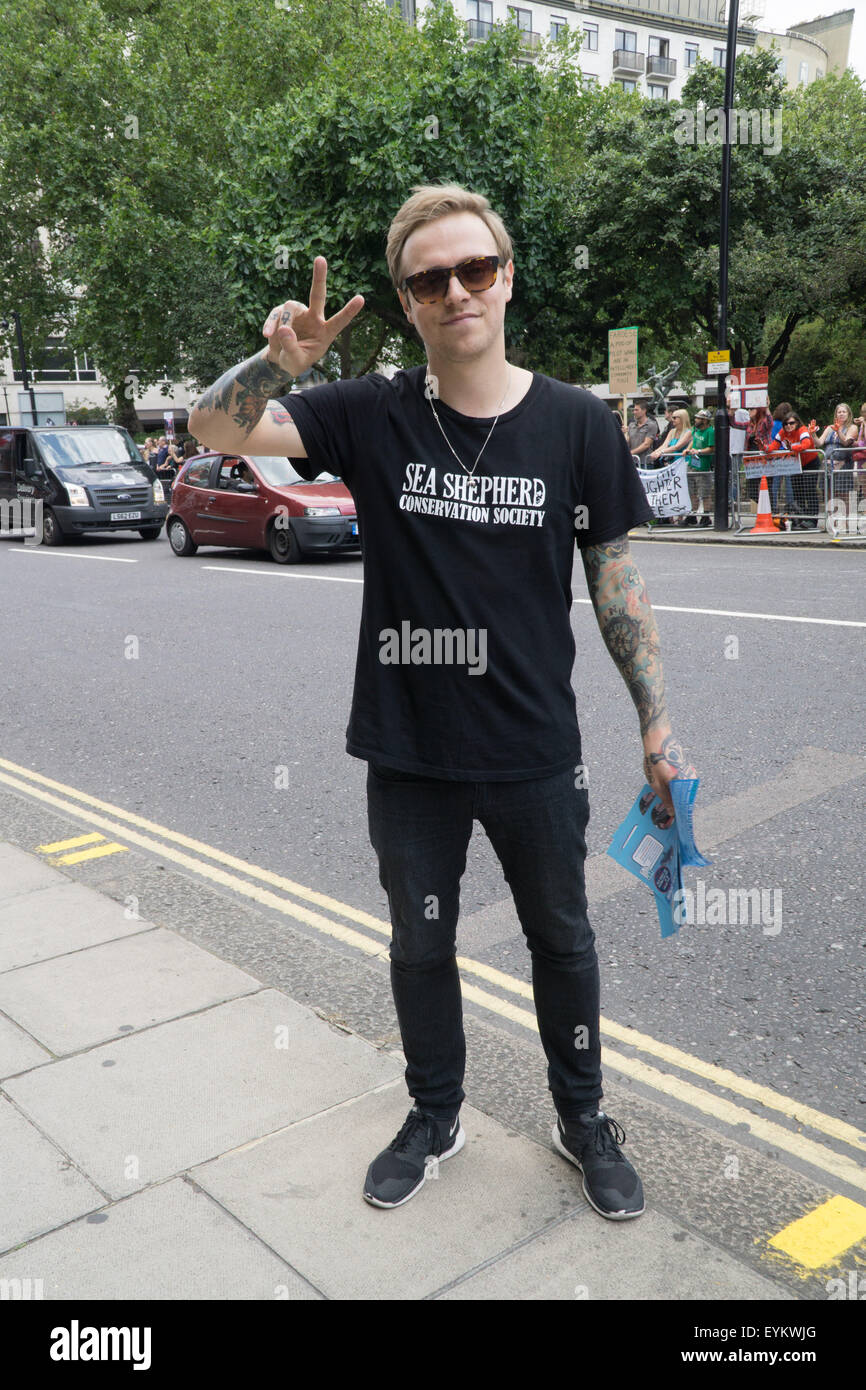 London,UK, 31th July 2015 : Singer Sam Carter 'The Architects, protests ...