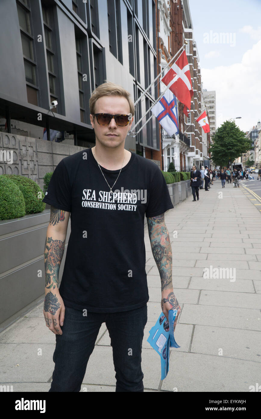 London,UK, 31th July 2015 : Singer Sam Carter 'The Architects, protests ...