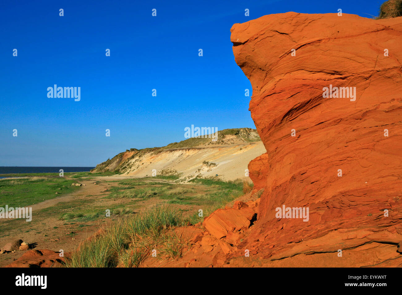 Rock formation from red Limonitsandstein at Morsum cliff on Sylt Stock ...