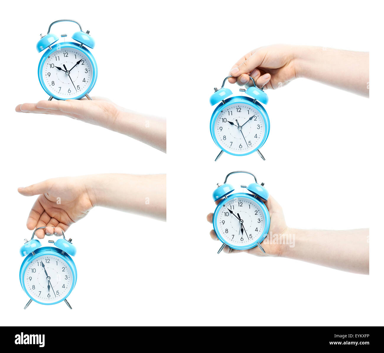 Caucasian male hand holding alarm clock Stock Photo - Alamy