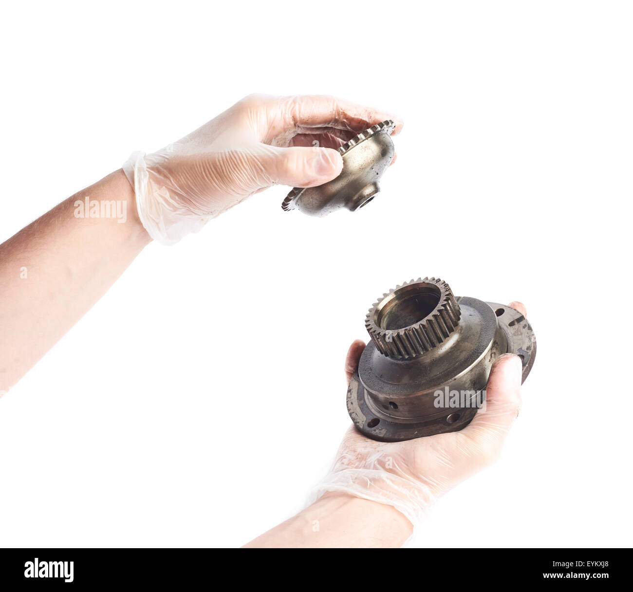 Worker's male hands holding engine's fragment Stock Photo - Alamy